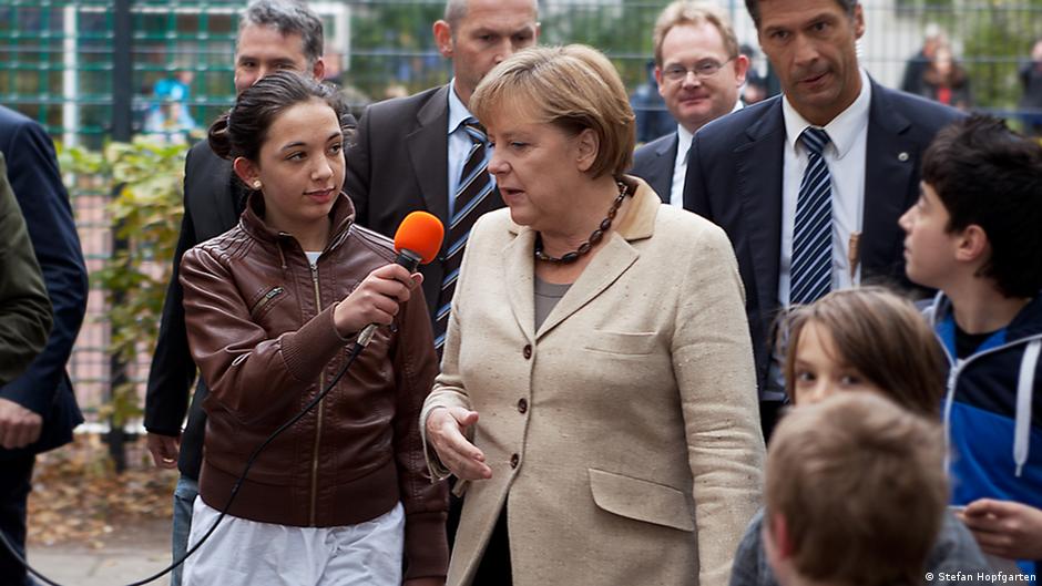 Radijojo's child reporter with German Chancellor, Angela Merkel