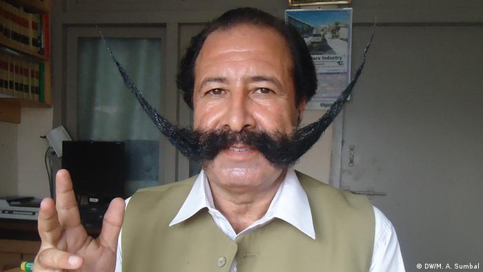 Moustache brings fame and danger to Pakistani