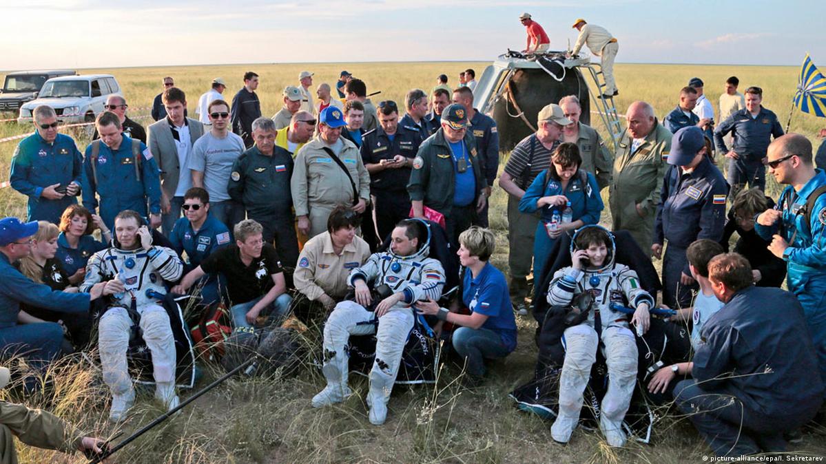 ISS astronauts make delayed return to Earth