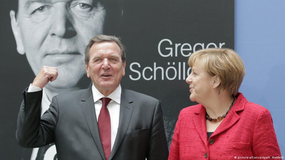Merkel praises former chancellor at biography launch