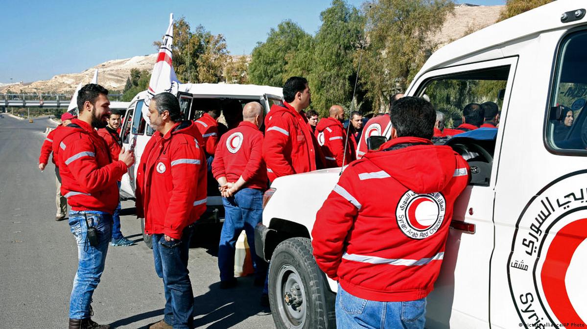 Aid convoys reach besieged Syrian towns