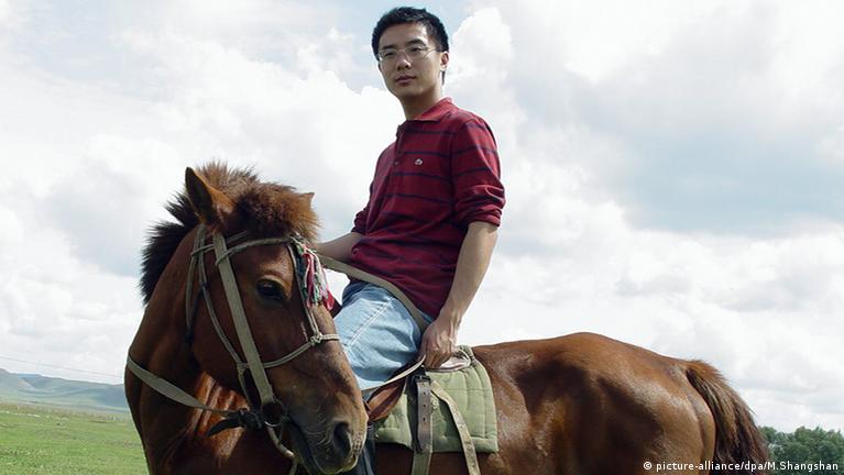Chinese reporter reappears after detention