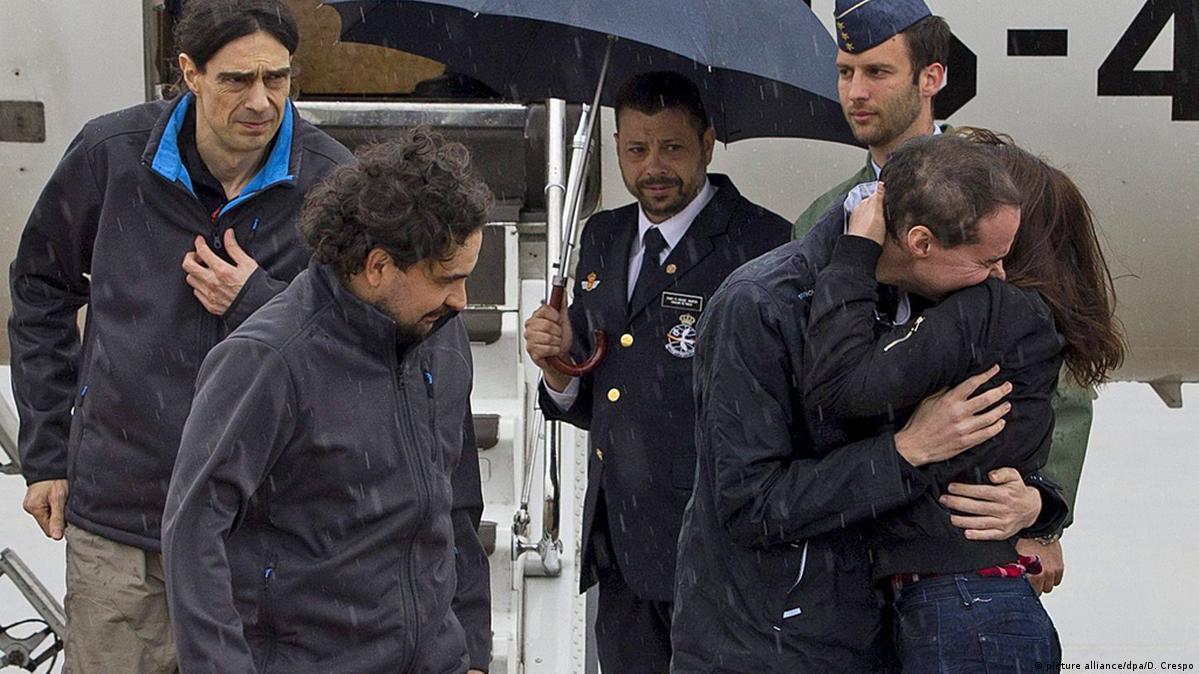 Kidnapped Spanish journalists return to Spain