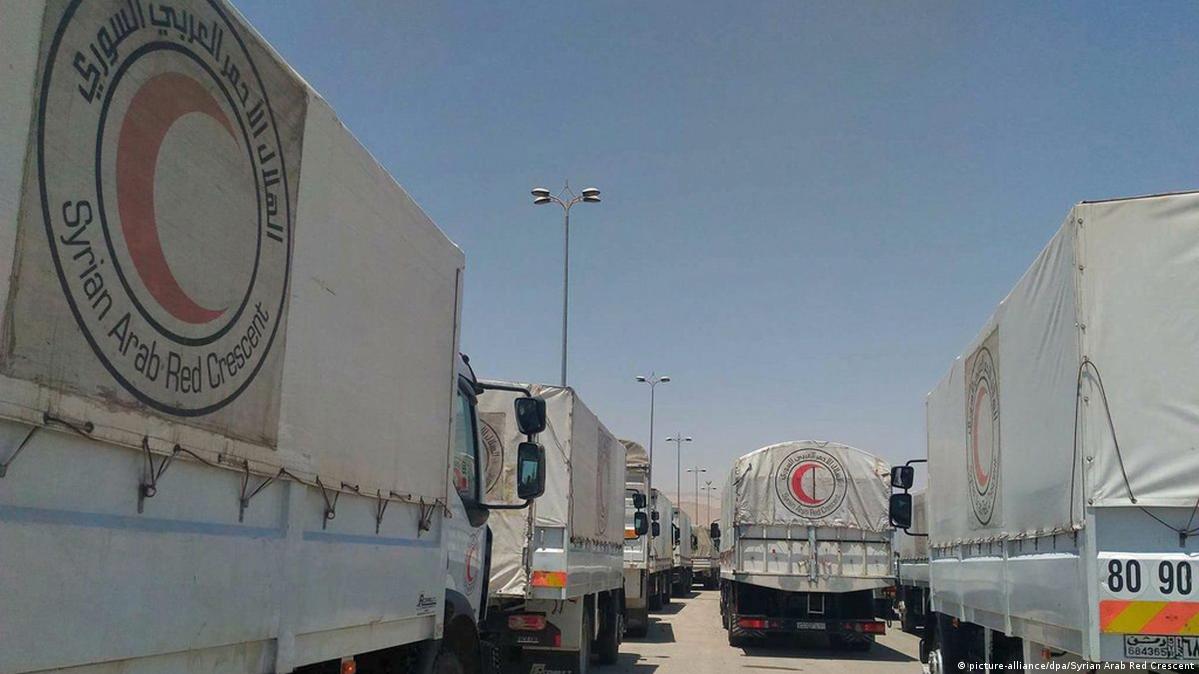 Aid convoys reach four besieged towns in Syria
