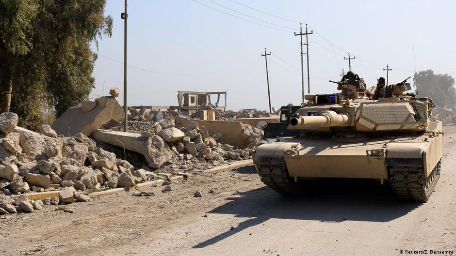 Iraqi forces claim key Mosul base – DW – 02/24/2017