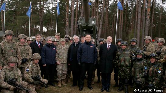 Poland welcomes 'historic' NATO deployment – DW – 04/14/2017
