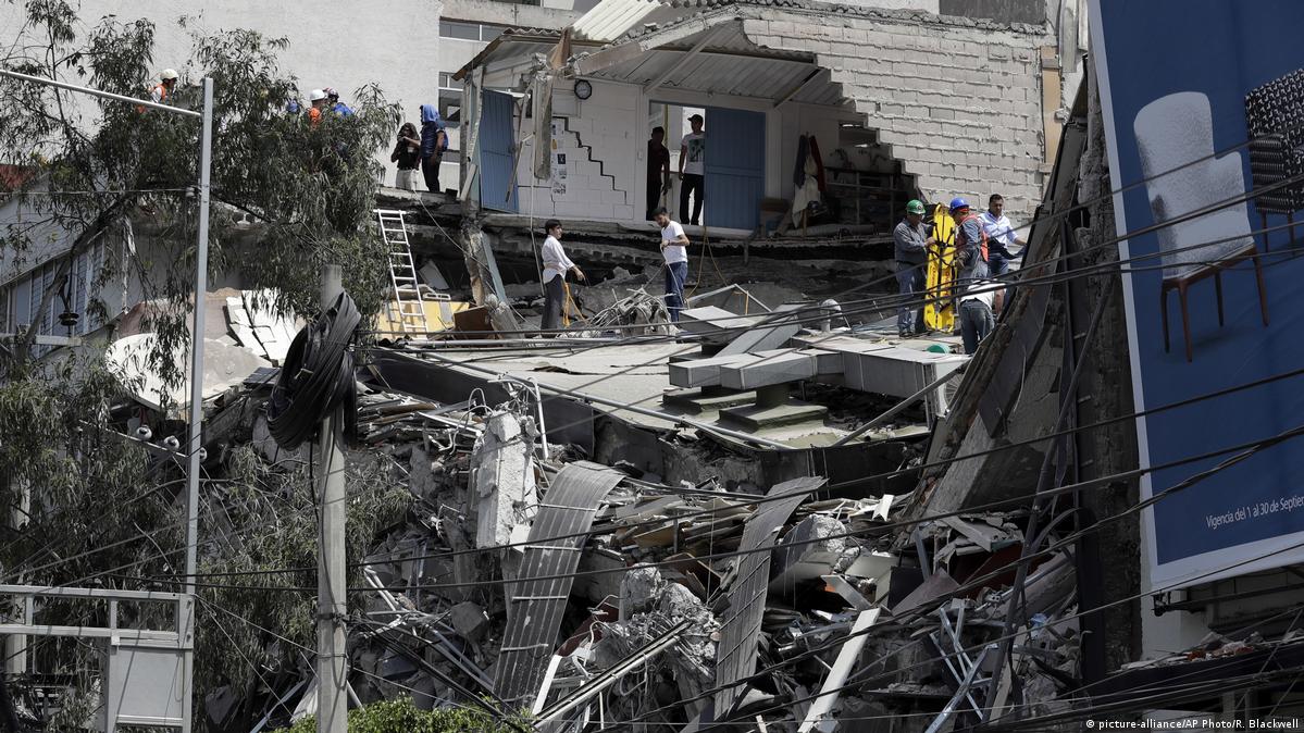 Buildings collapse as powerful earthquake rocks Mexico