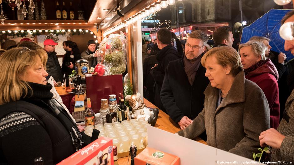 Merkel meets with Christmas market victims after criticism