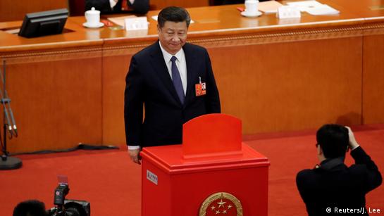 China scraps presidential term limit