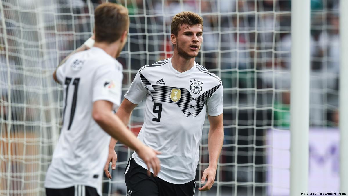 Germany win but Saudi Arabia offer stern test