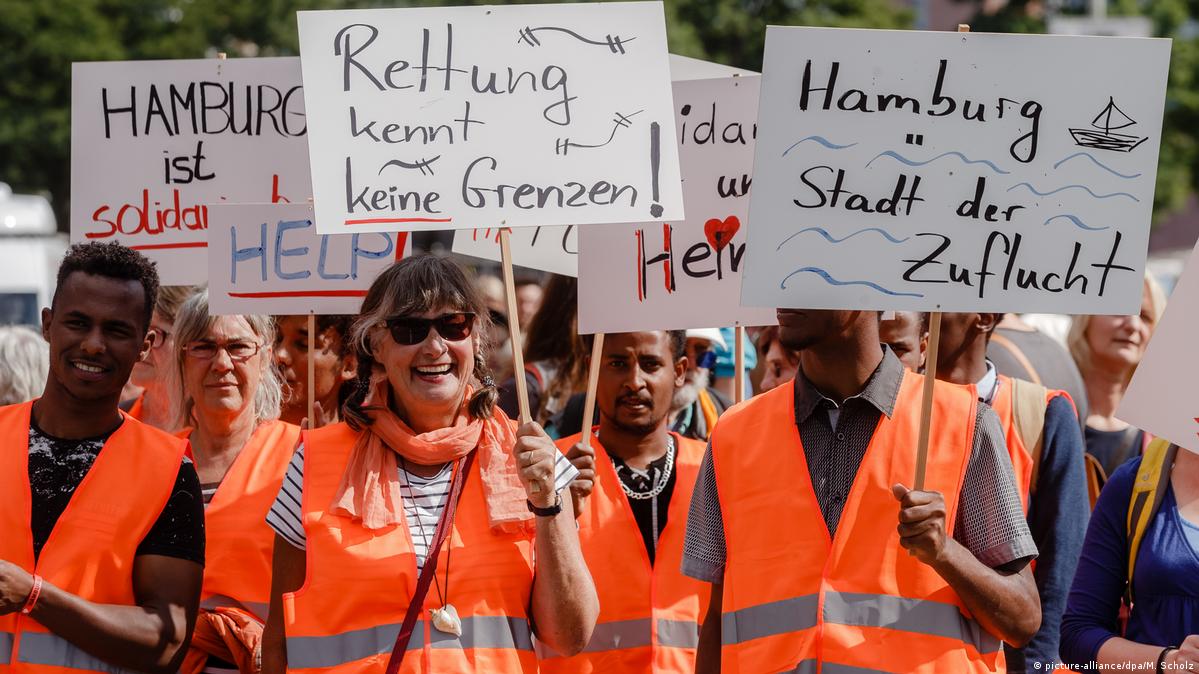 Thousands march in solidarity with migrants – DW – 09/03/2018