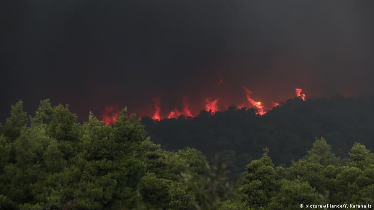 Villages evacuated as wildfires rage in Greece