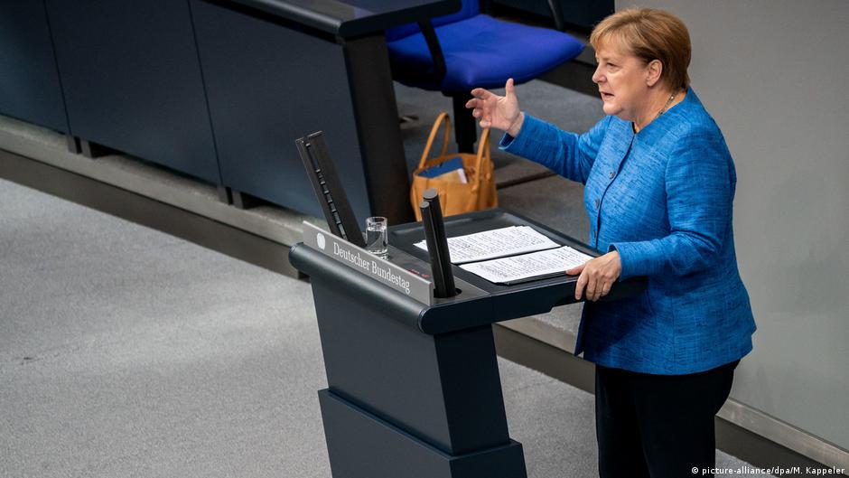 Angela Merkel: More climate action, less hate