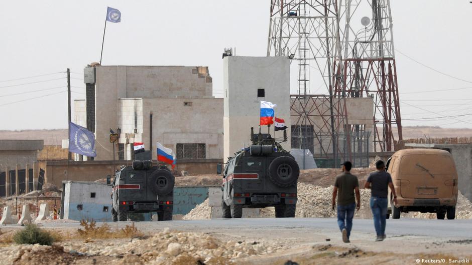 Russia-backed Syrian forces enter key city – DW – 10/15/2019