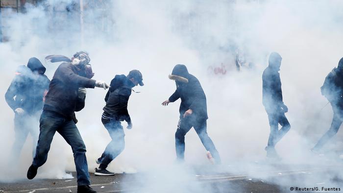 France: Police and protesters clash in massive strike over Macron′s ...