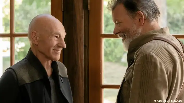 film still Star Trek: Picard, Picard and Commander Riker smile at each ...