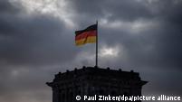 German coalition's demise hits unsettled nation