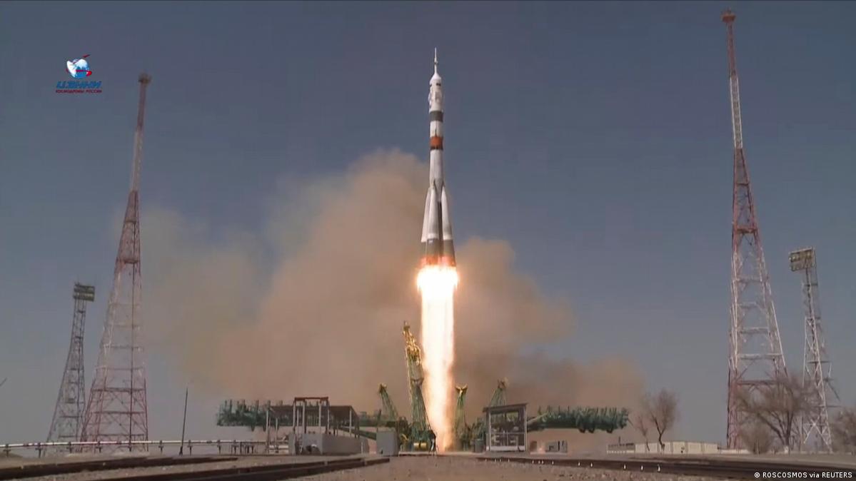 US-Russian trio docks at International Space Station
