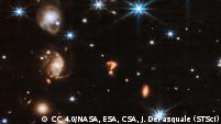 The truth behind the JWST photo of a question mark in space – DW – 08 ...