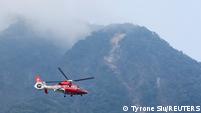 Taiwan rescuers free nine trapped in open cave trail – DW – 04/05/2024