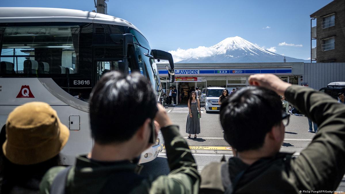 Japanese town blocks tourists from seeing Mount Fuji