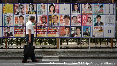 Japan election: Ruling party loses majority, says NHK