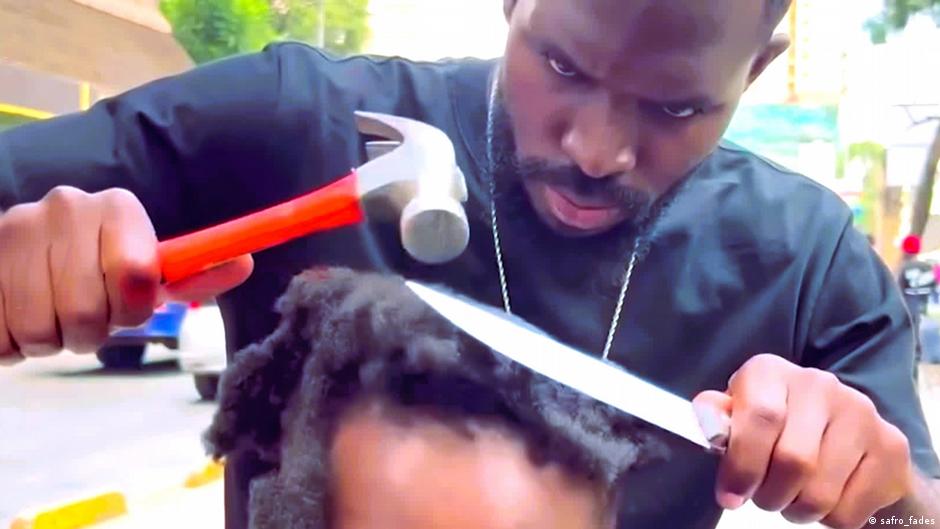 Safari — the barber with machete and shovel