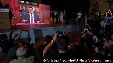 Romania election: Hard-right George Simion wins 1st round