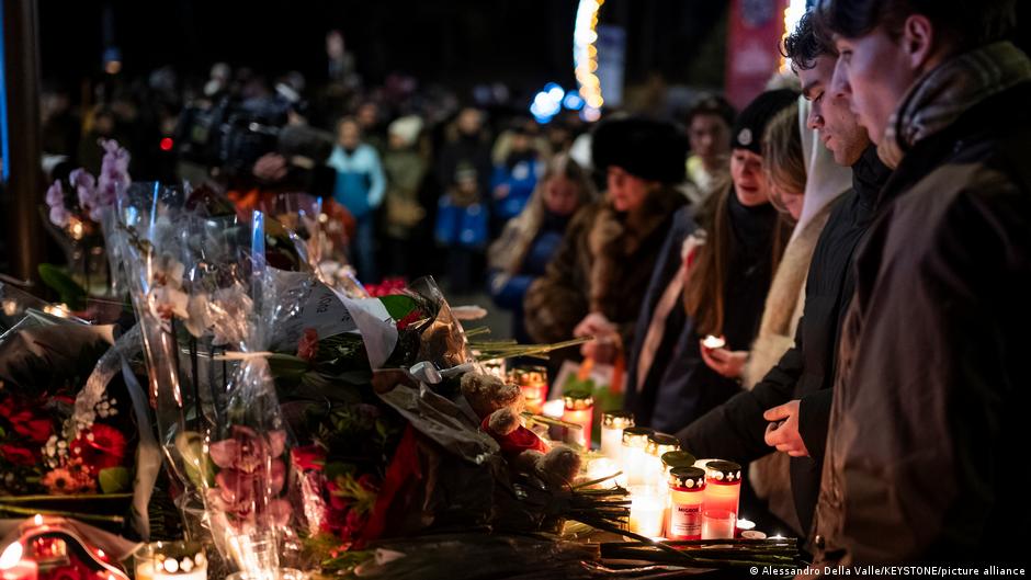 Mourners gather for vigil after Swiss ski resort fire – DW – 01/02/2026