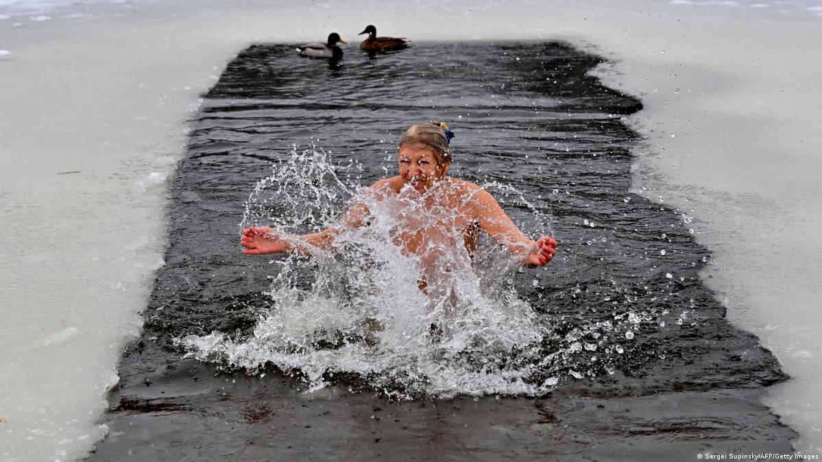 Orthodox Christians plunge into ice-cold religious ritual