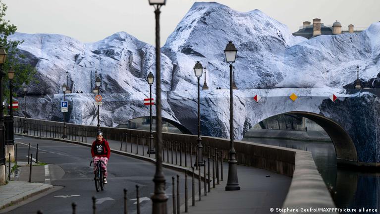 Artist JR's wrapped bridge in Paris opens